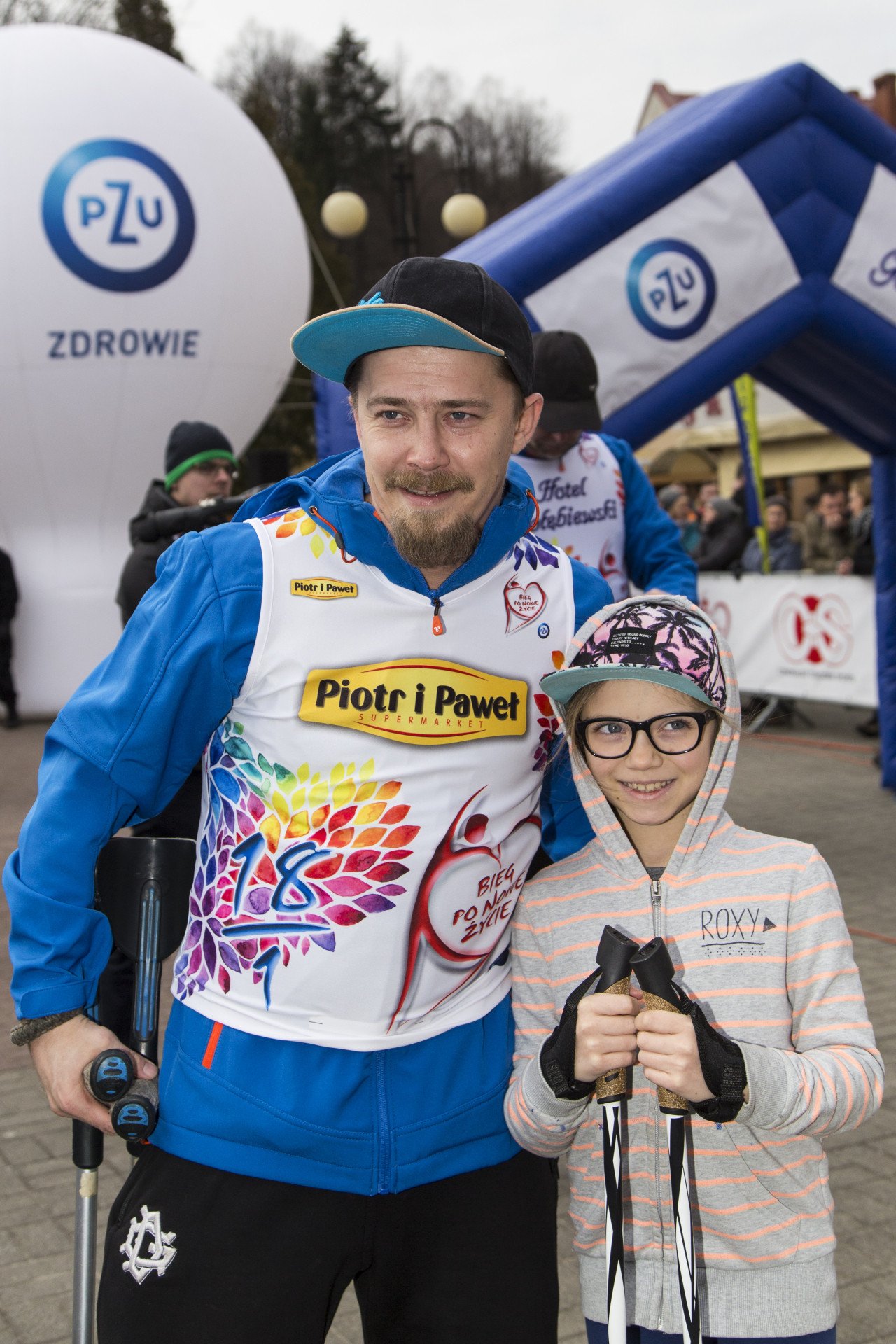 Bartosz Obuchowicz z córką w 2016 roku na imprezie "Bieg po Nowe Życie ...